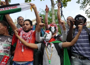 Thousands stage protest in Paris, defying authorities | PBS News