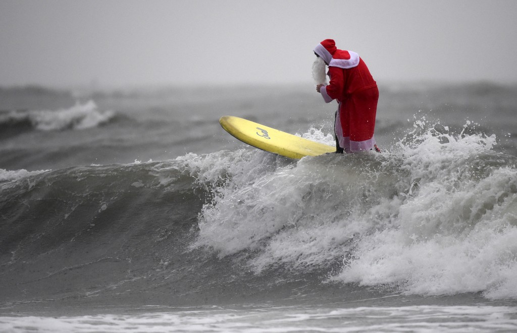 Photos: What Santa does on his day off | PBS News
