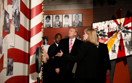 Trump hails civil rights heroes; protesters pan his record | PBS News