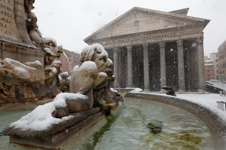 Rome blanketed by snow as Arctic storm sets European records | PBS News