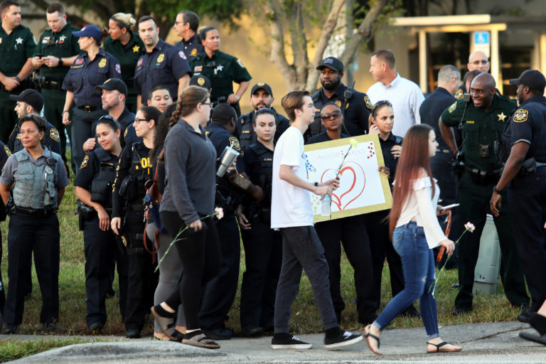 Photos: Marjory Stoneman Douglas High reopens after shooting | PBS News