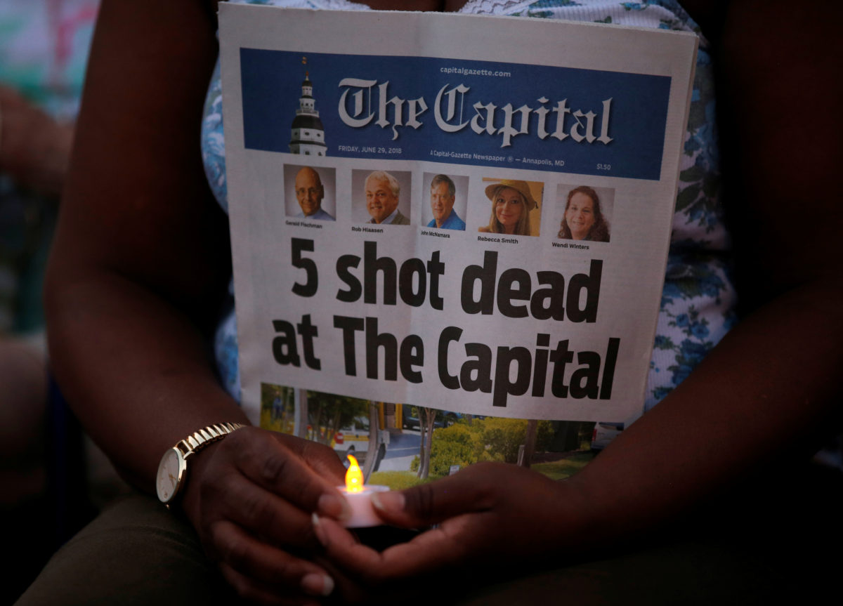 Small capital city draped in grief by newspaper shooting | PBS News