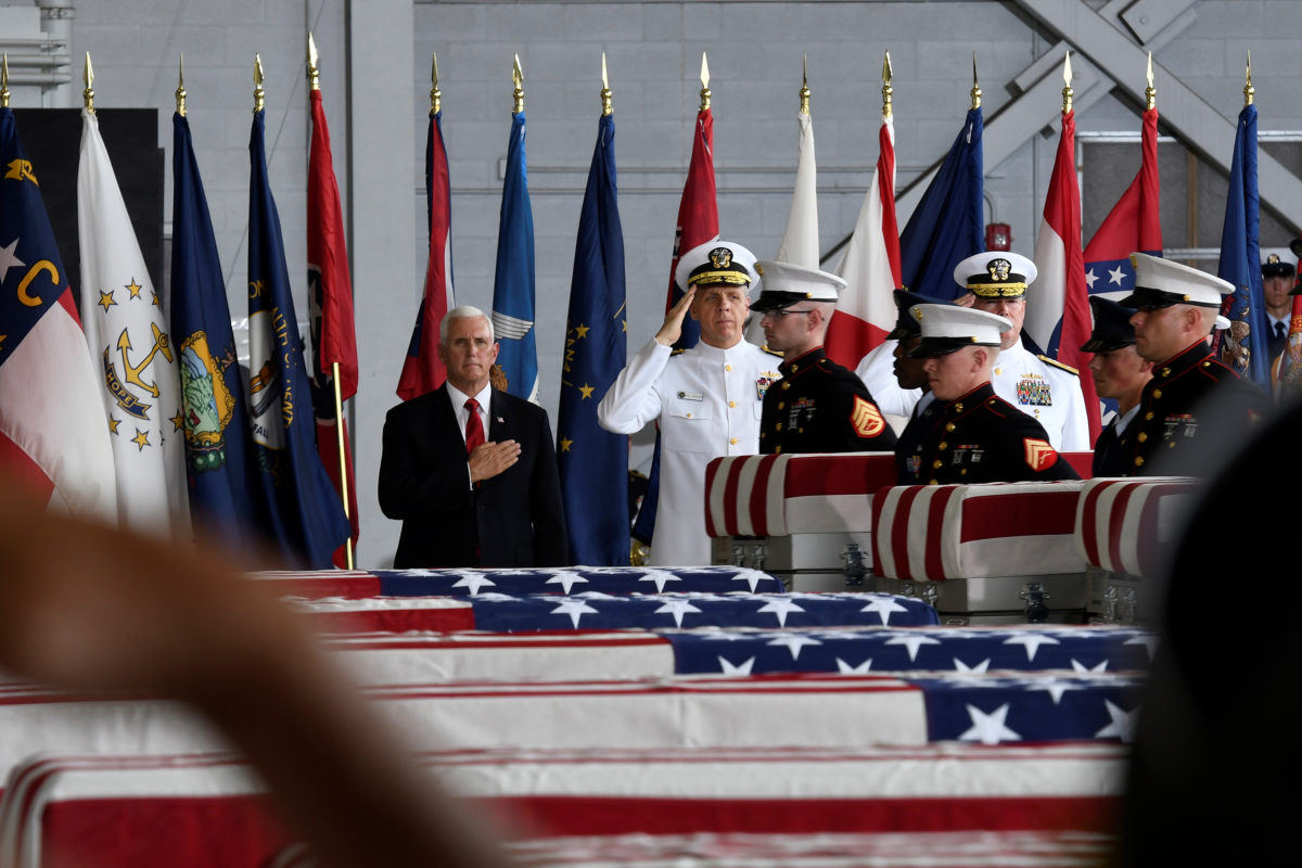 Vice President Mike Pence, military officials receive remains from ...
