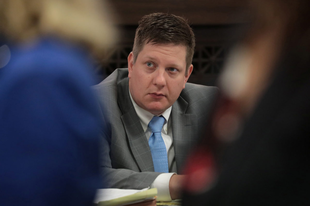 Defense for Chicago police officer puts slain teen on trial | PBS News