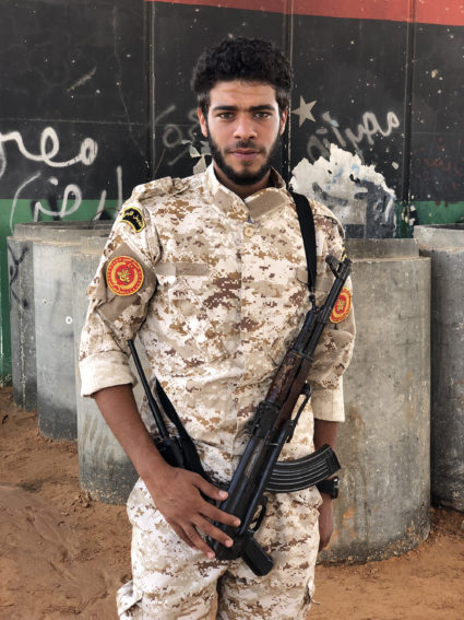 We began to film secretly in Libya. Then we had to escape | PBS News