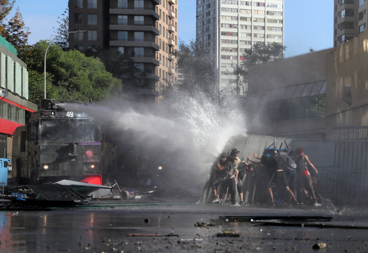 Death toll rises to 15 from Chilean protest clashes | PBS NewsHour