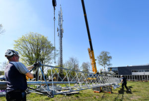 Conspiracy theorists burn 5G towers claiming link to virus | PBS News