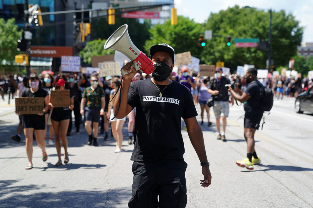 Atlanta erupts in protest after another black man dies at the hands of ...