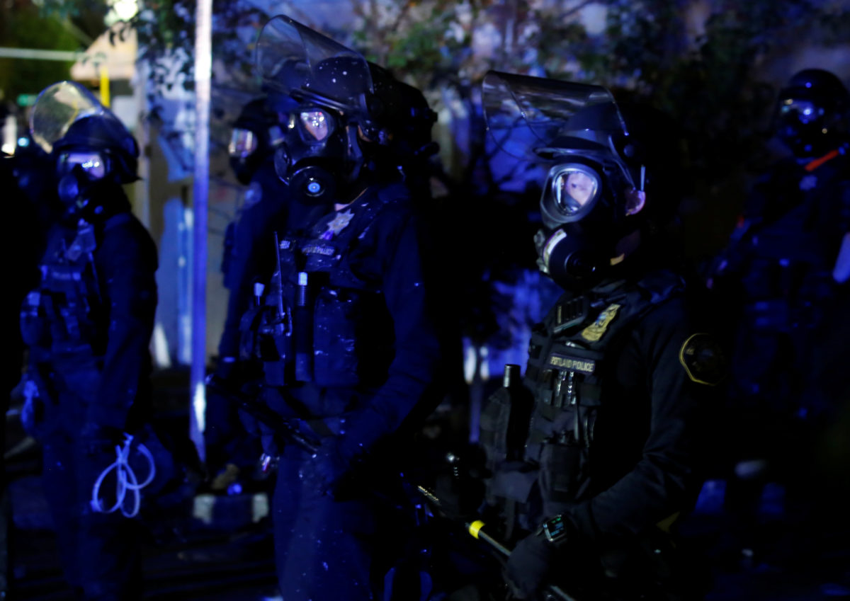 Portland asks U.S. to rescind deputization of city police | PBS News