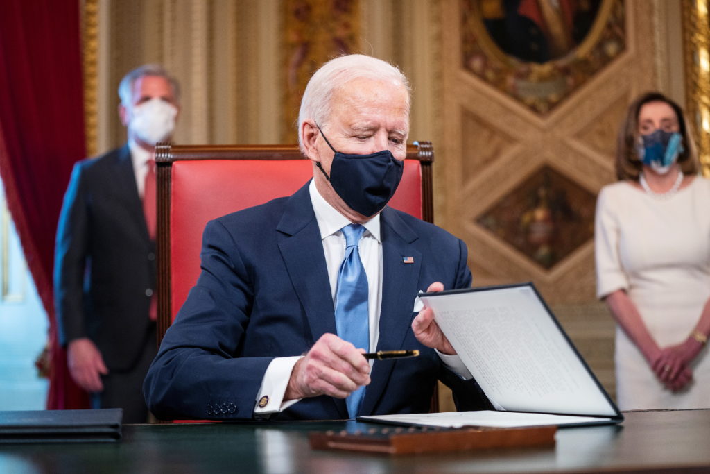 WATCH: In first act, Biden signs official proclamations | PBS News