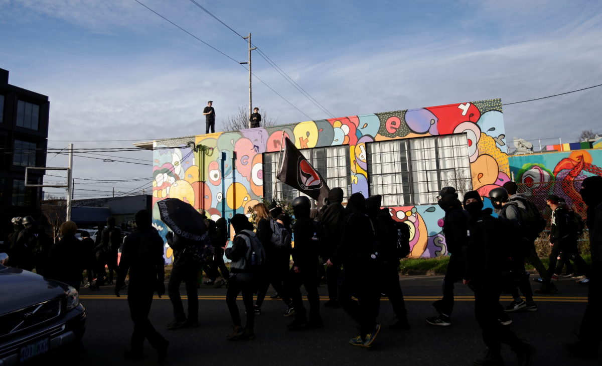 Protesters gather, damage Democratic headquarters in Oregon | PBS News