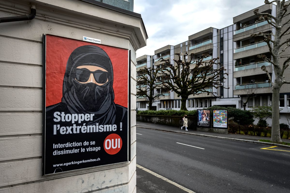 Swiss narrowly back proposal to ban face coverings in public | PBS News ...
