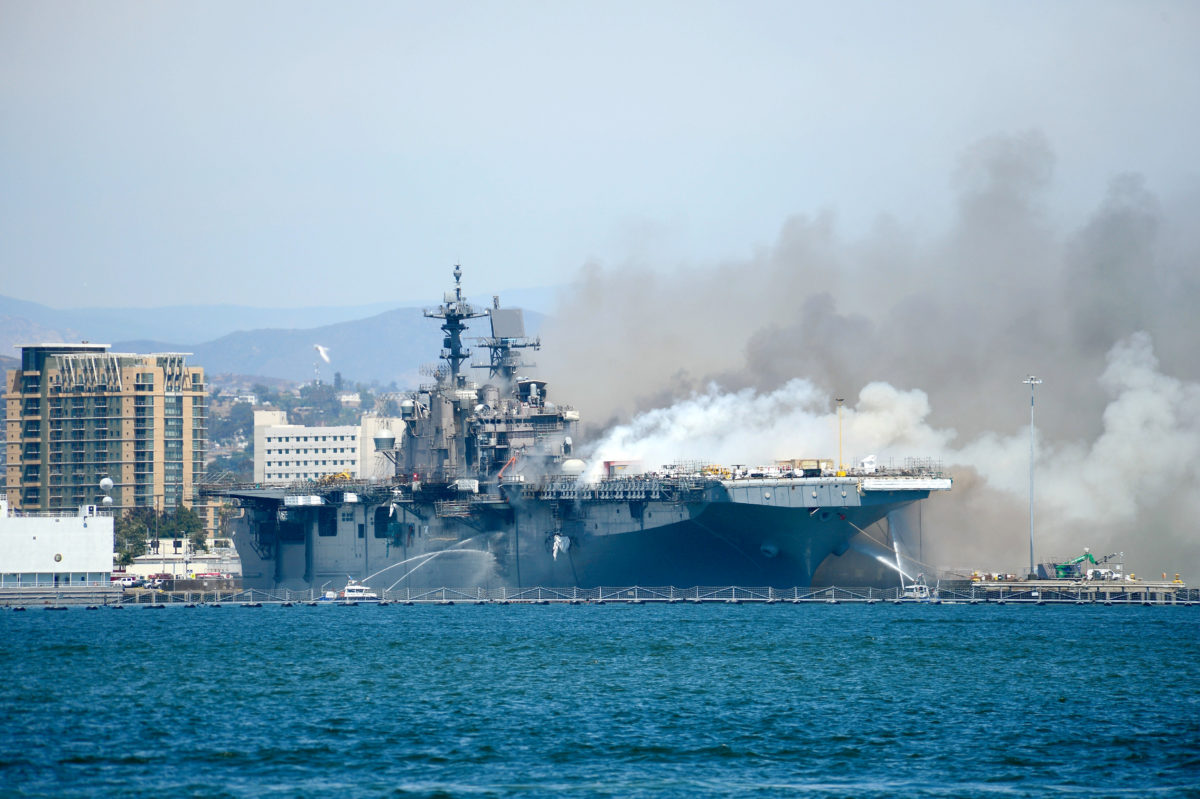Navy charges sailor with setting fire that destroyed warship | PBS News