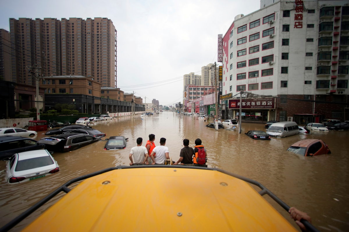 China’s Zhengzhou begins cleanup after floods ravage city | PBS News
