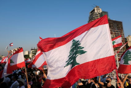 Grieving and angry, Lebanese mark year since horrific blast | PBS NewsHour