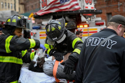 19 dead, including 9 children, in NYC apartment fire | PBS News