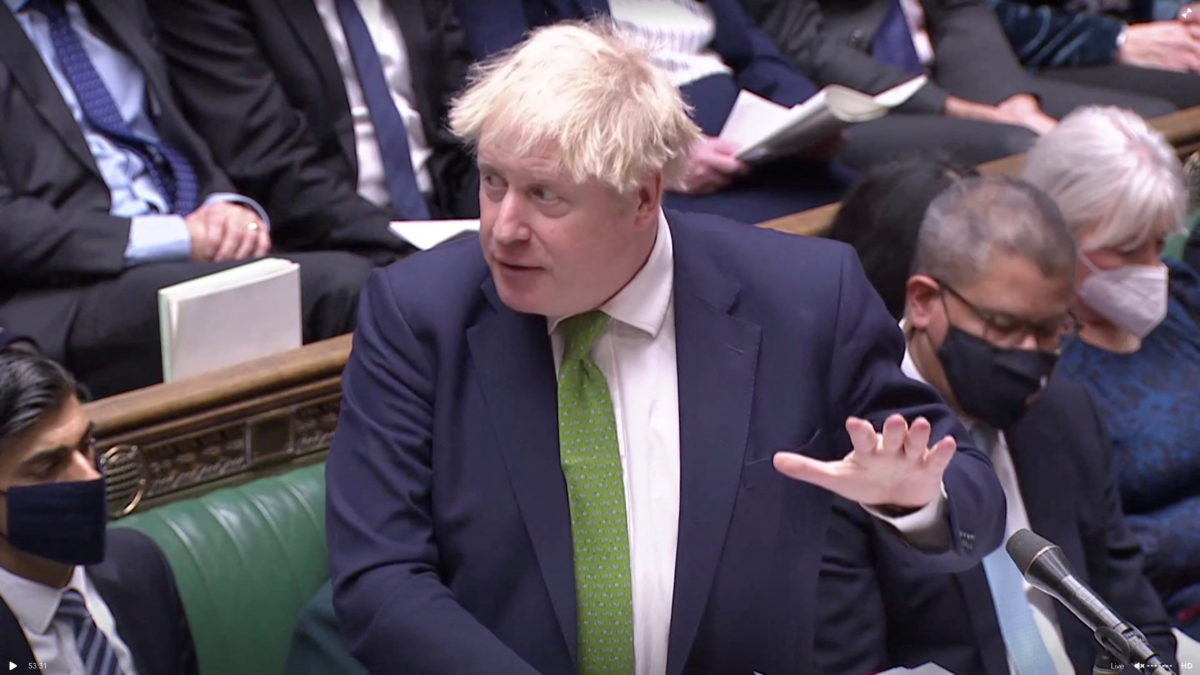 Facing calls to resign, U.K. prime minister Johnson defends record ...