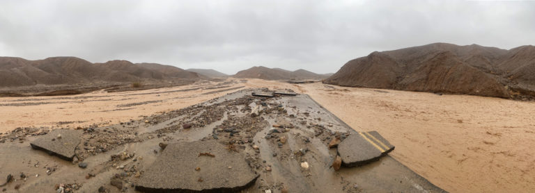 Roads remain closed after record-breaking rains flood Death Valley ...