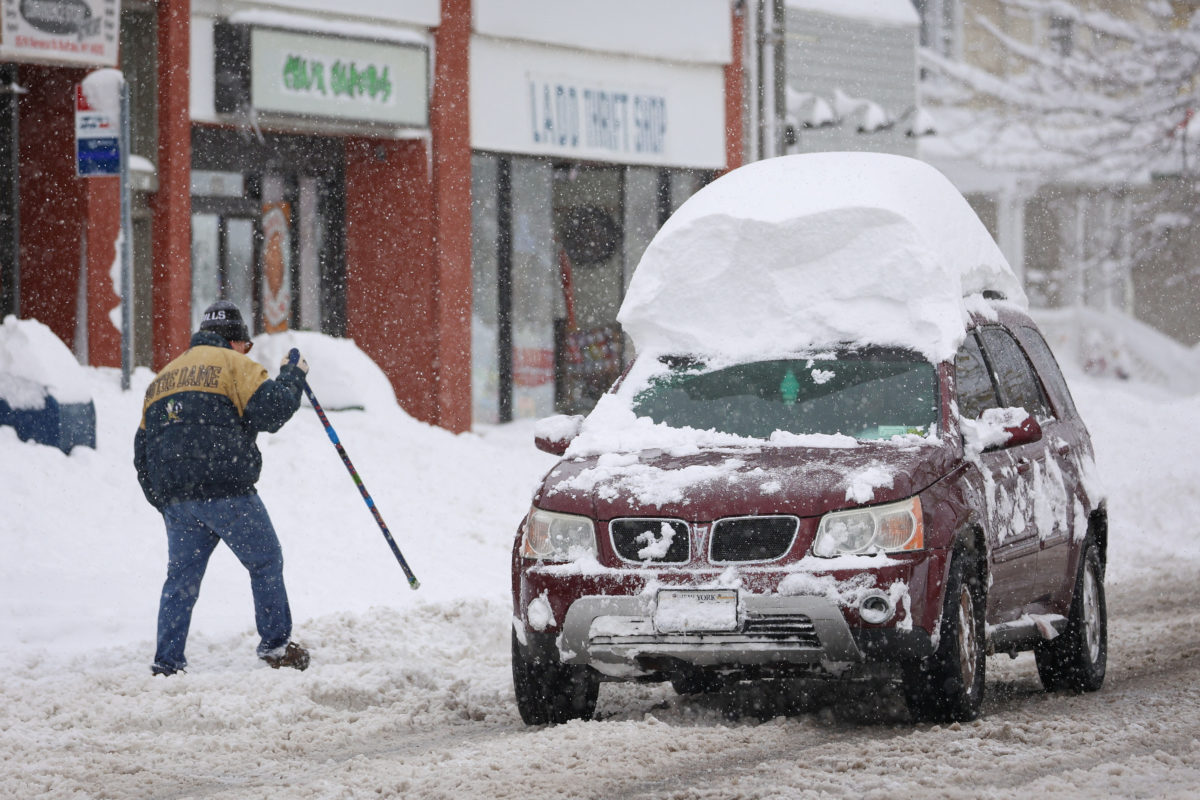 PHOTOS: Record snowstorm buries parts of upstate New York under 6 feet of snow | PBS News