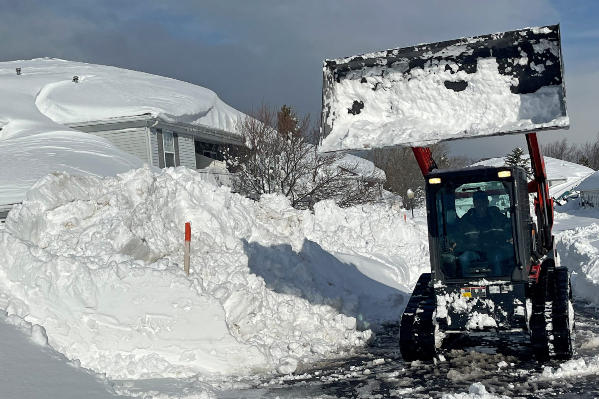 PHOTOS: Record snowstorm buries parts of upstate New York under 6 feet of snow | PBS News