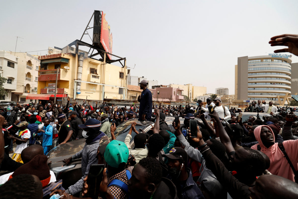 Senegal police smash car window, forcibly remove opposition leader ...