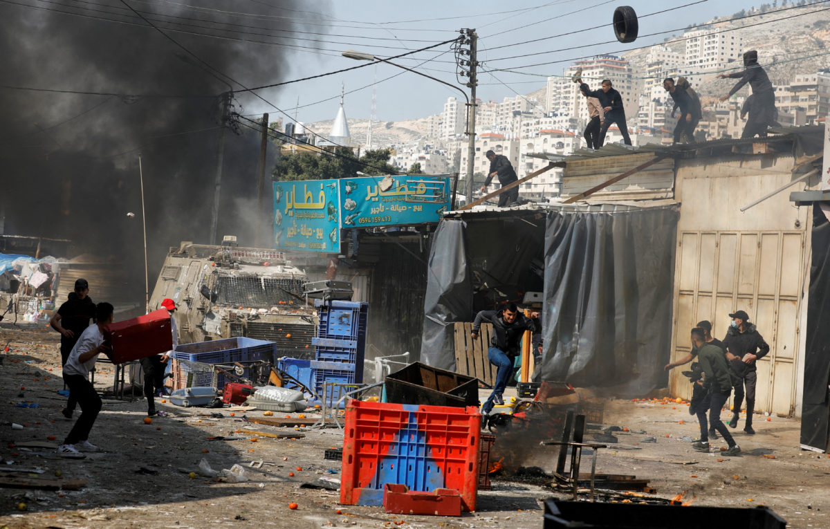 At least 10 Palestinians killed in Israeli raid of West Bank city | PBS News