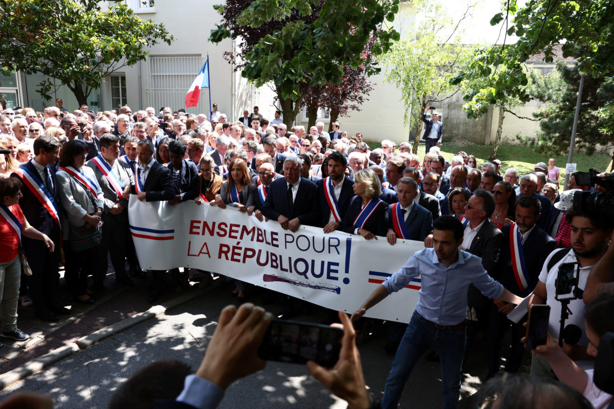 Crowds gather in solidarity with local governments at town halls across ...