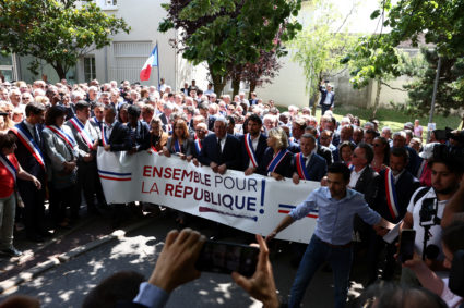 Crowds gather in solidarity with local governments at town halls across ...