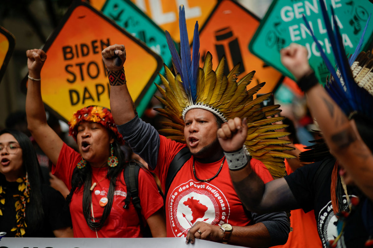 PHOTOS: Tens of thousands of activists march to kick off climate summit ...