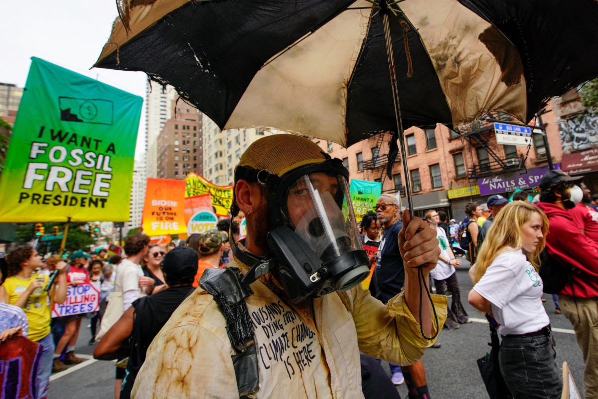PHOTOS: Tens of thousands of activists march to kick off climate summit ...