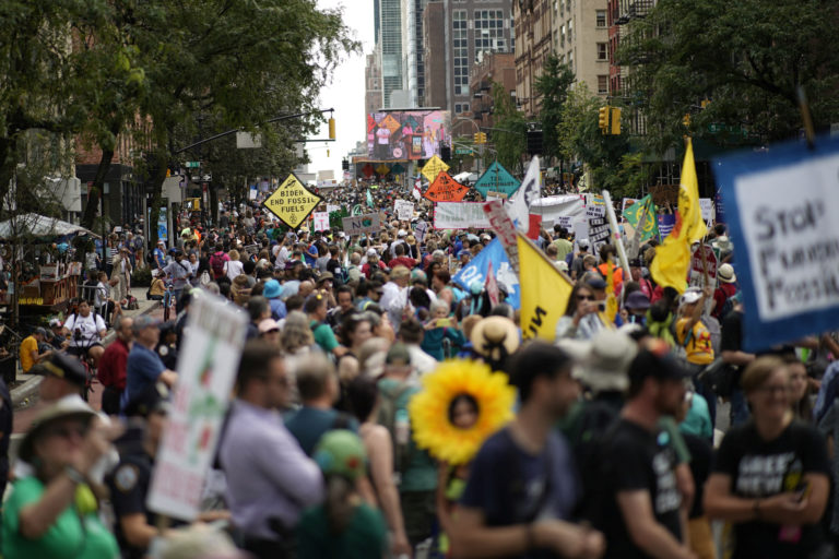PHOTOS: Tens of thousands of activists march to kick off climate summit ...