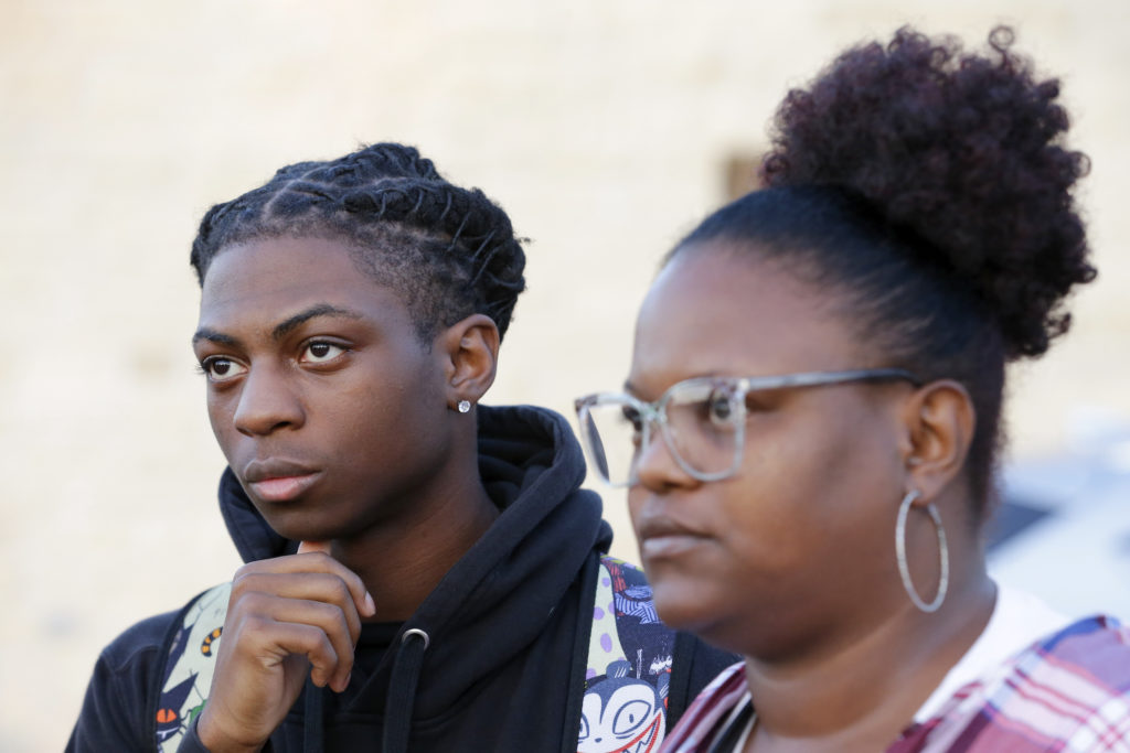 Family of Black teen suspended from school for his hairstyle sues Texas ...