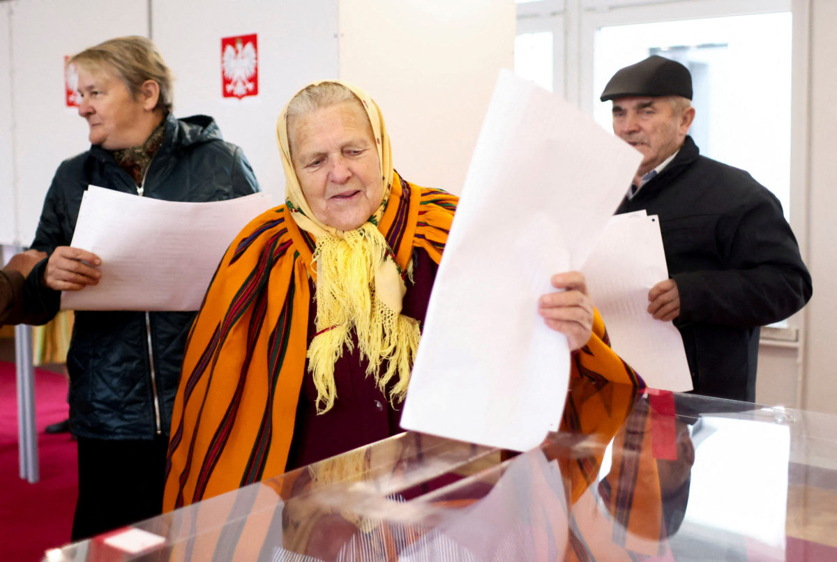 Poles cast their votes for centrist opposition parties after years of ...