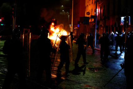 After knife attack leaves 3 children injured, violent clashes break out in Dublin | PBS News