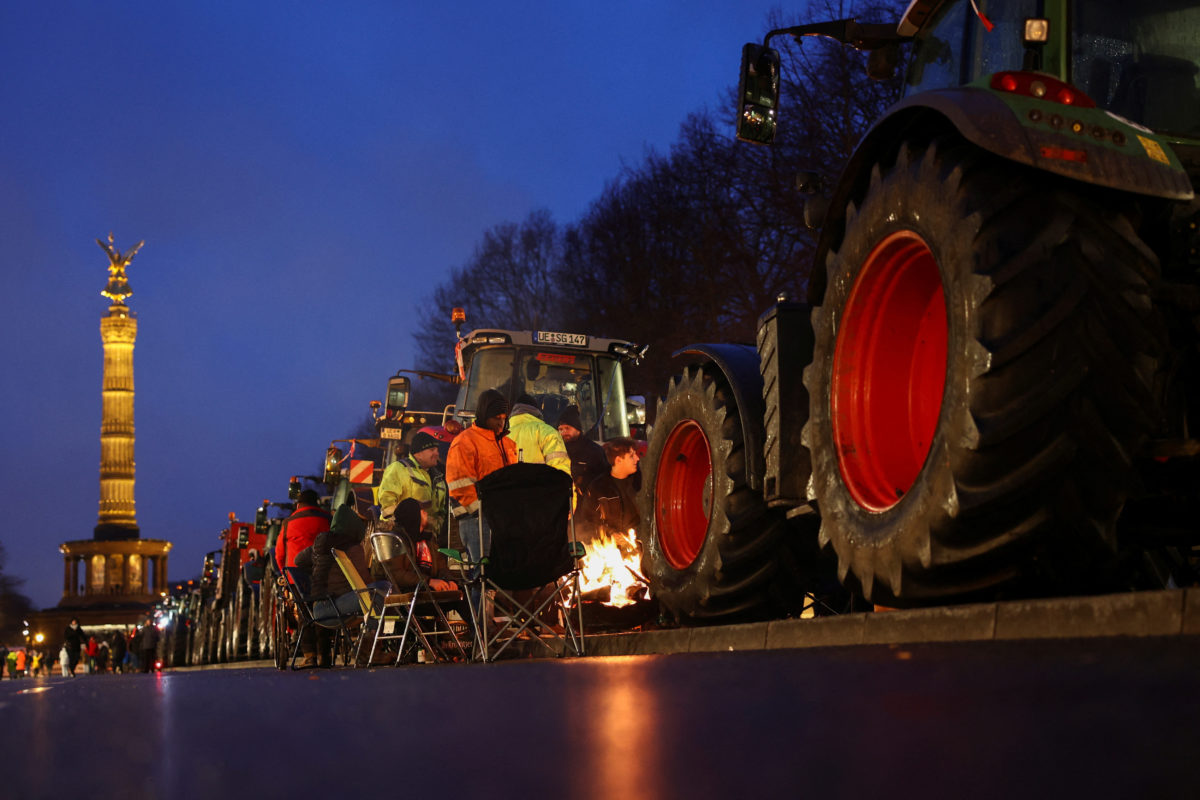 German farmers and their tractors throng Berlin in protest against fuel ...