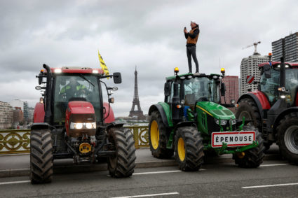 Angry French farmers protest with their tractors again in the streets ...
