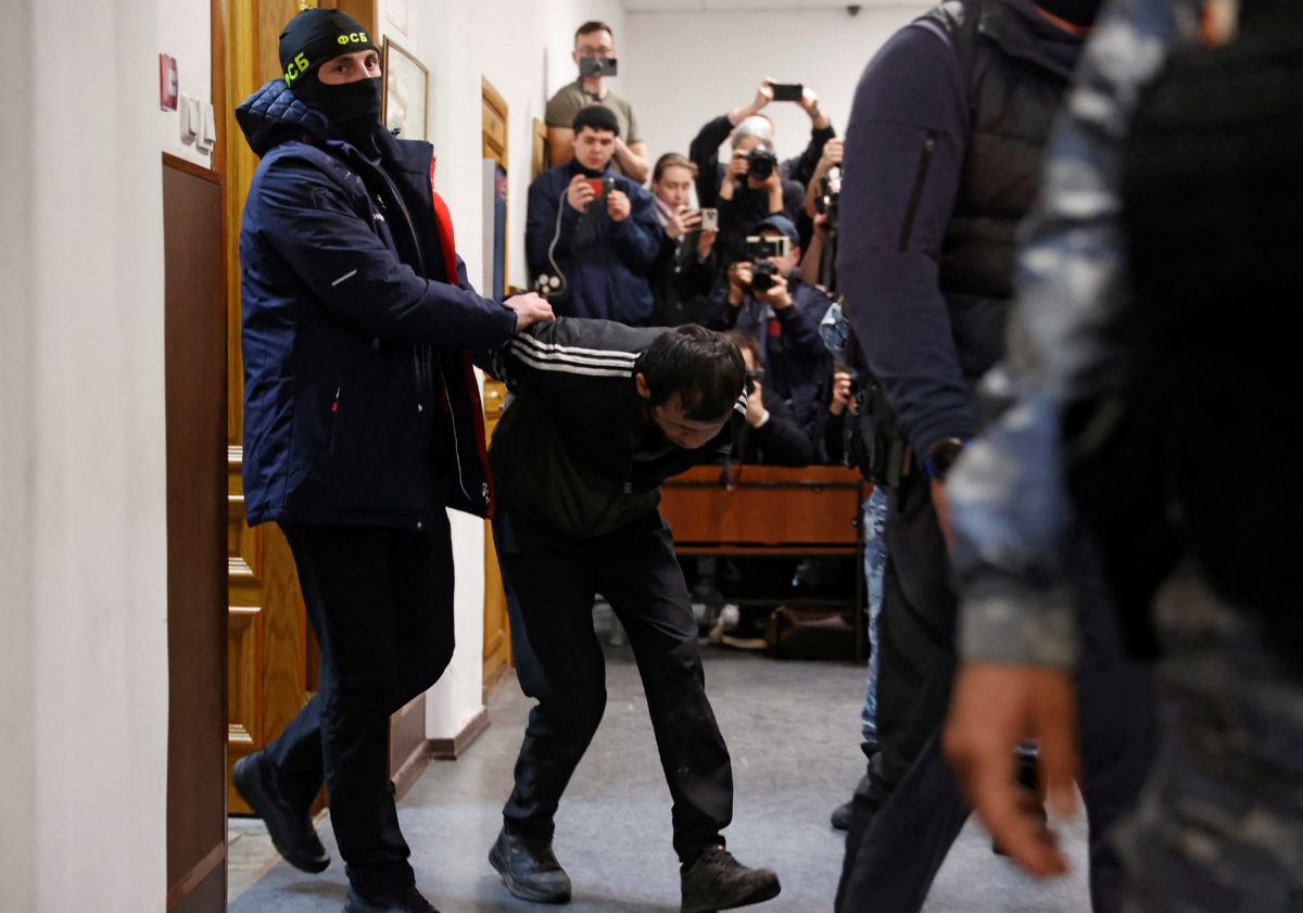 Russia concert hall attack suspects make appearance in Moscow courtroom ...