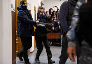 Russia concert hall attack suspects make appearance in Moscow courtroom ...