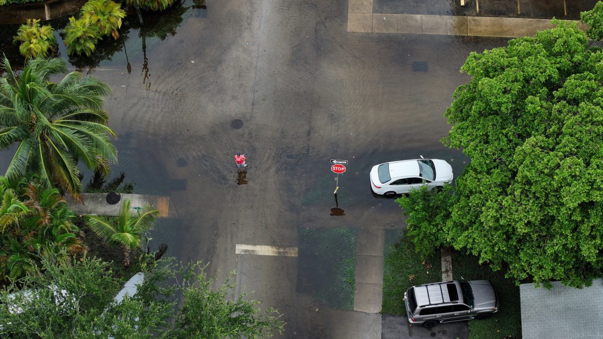 Heavy rainfall in southern Florida delays flights, jams streets with ...