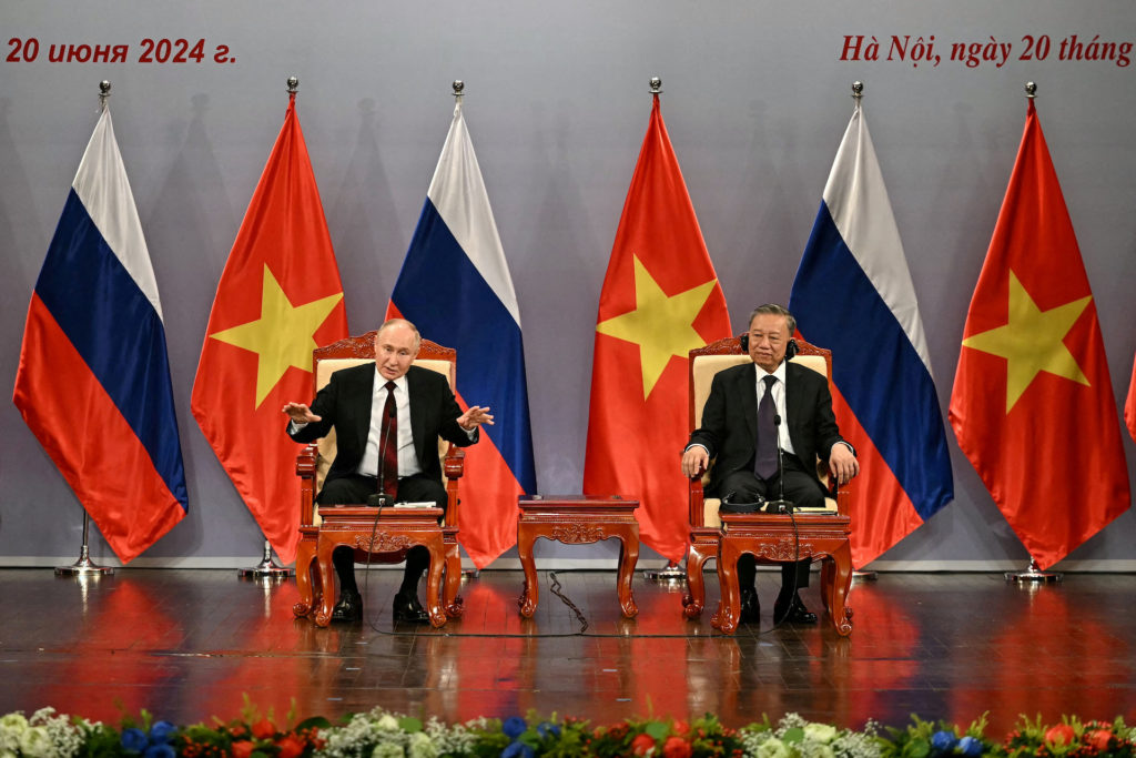 News Wrap: Putin sign deals with Vietnam during trip to bolster Russian ...