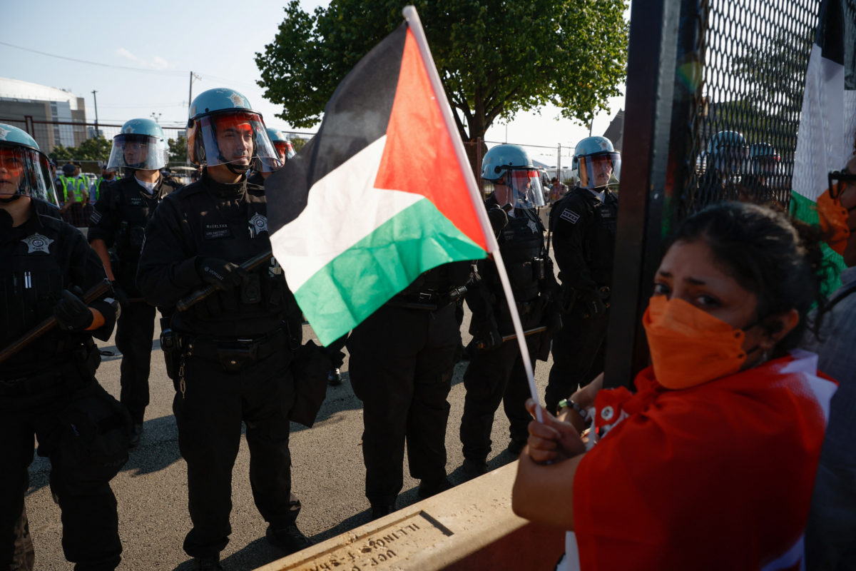 Protesters rally outside Chicago DNC, where officials pledge to keep ...