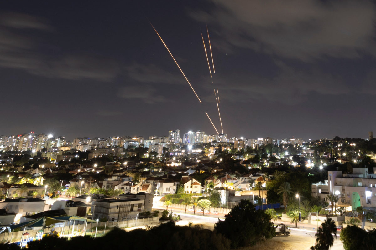 Iran fires dozens of missiles into Israel in sharp escalation of ...
