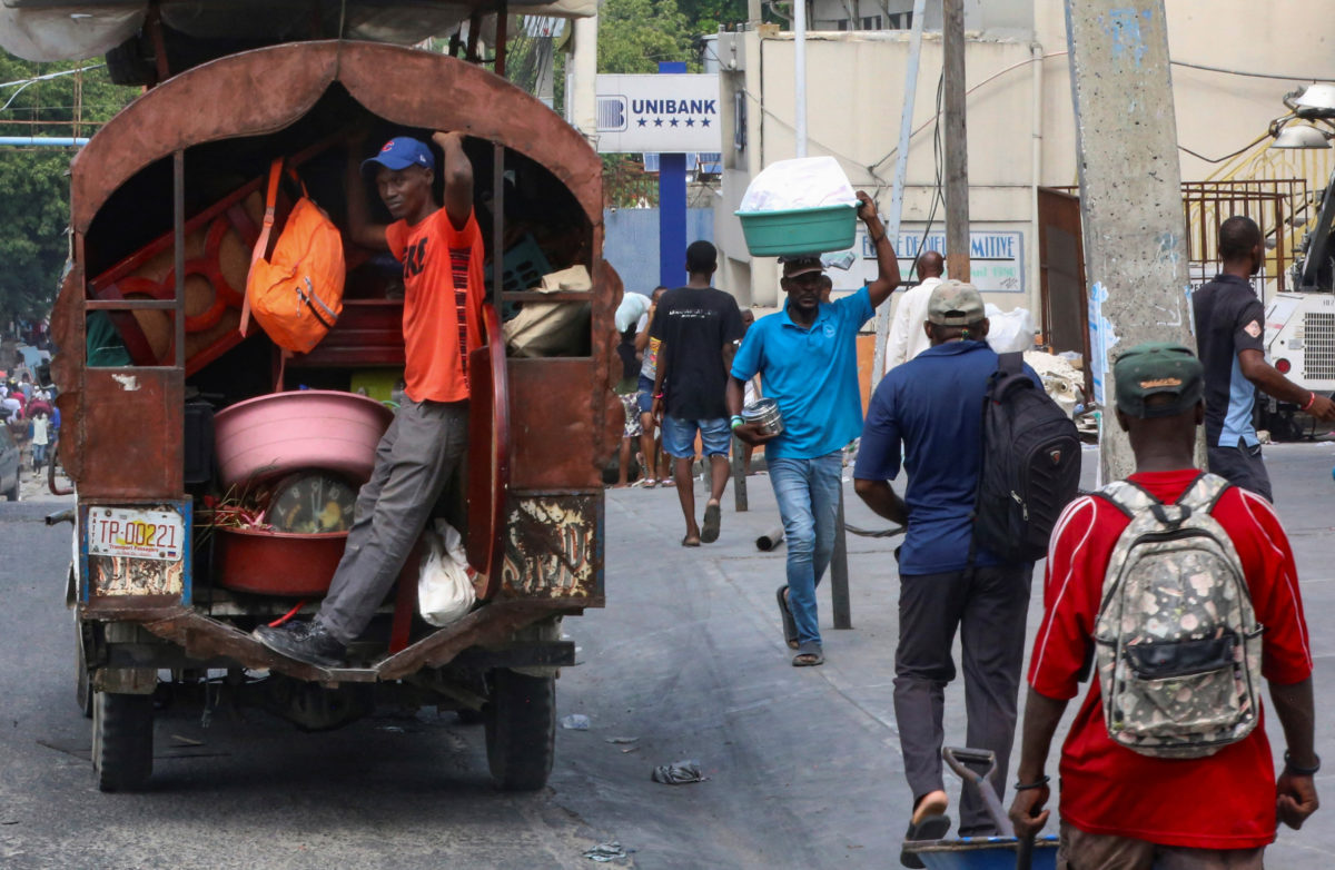 Masses of Haitians flee homes in the capital as gang violence explodes ...