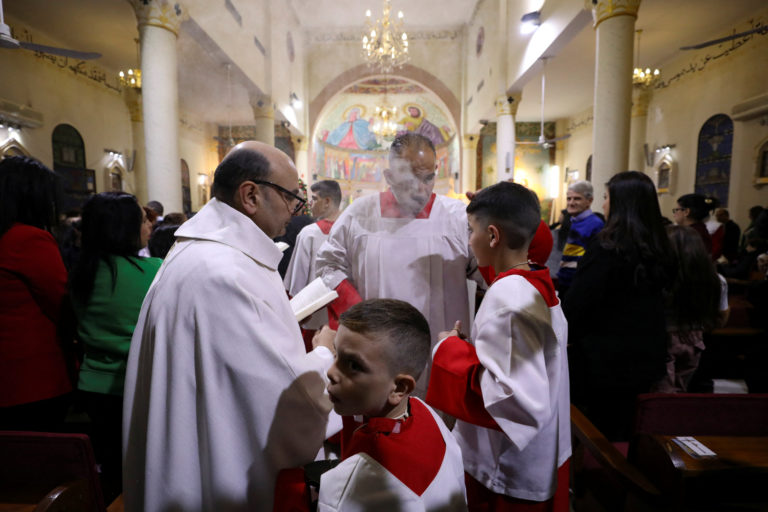 PHOTOS: Christmas and Hanukkah celebrations around the world | PBS News