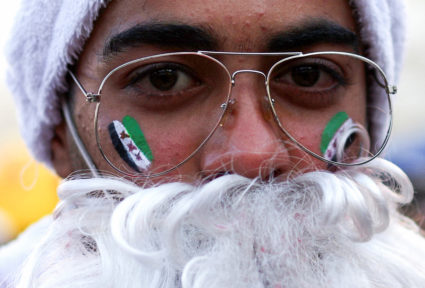 PHOTOS: Christmas and Hanukkah celebrations around the world | PBS News