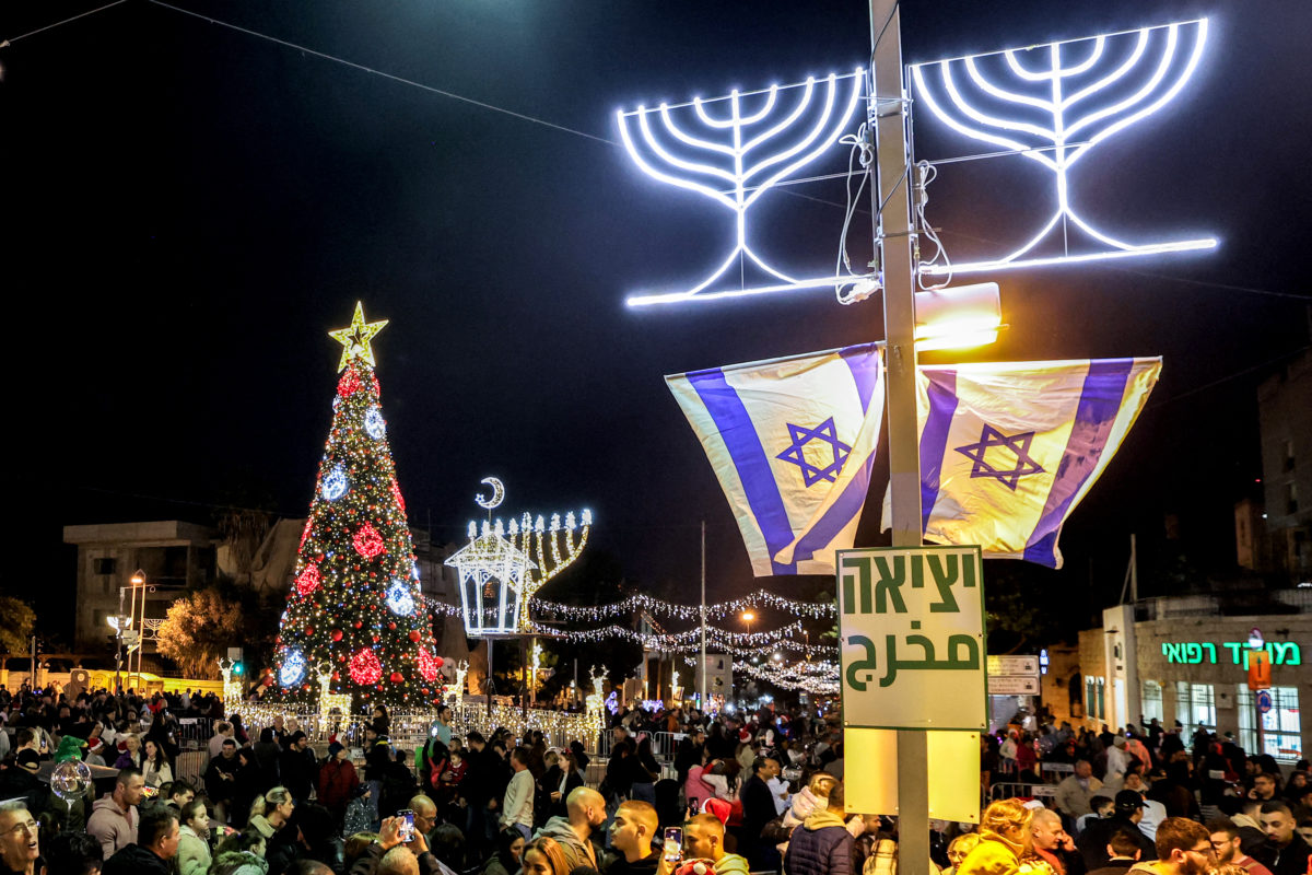 PHOTOS: Christmas and Hanukkah celebrations around the world | PBS News