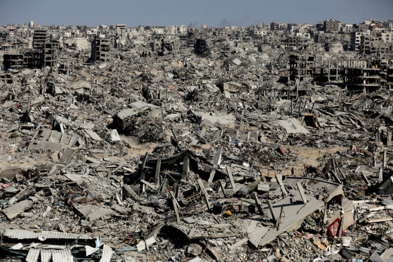 Palestinians return to rubble in ‘ghost towns’ of Gaza | PBS News