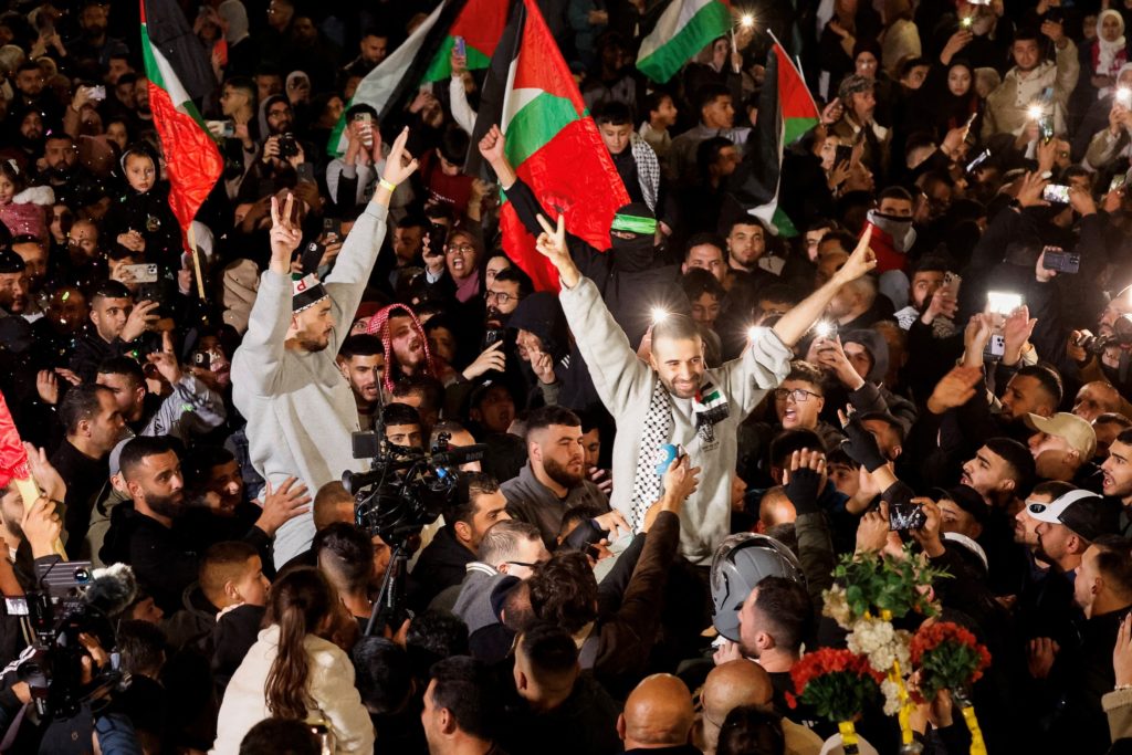 News Wrap: Hamas frees 8 hostages, Israel releases 100 prisoners in 3rd ...