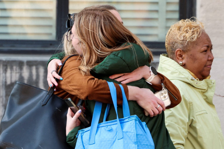PHOTOS: Hundreds of HHS employees wait in a line stretching around the ...