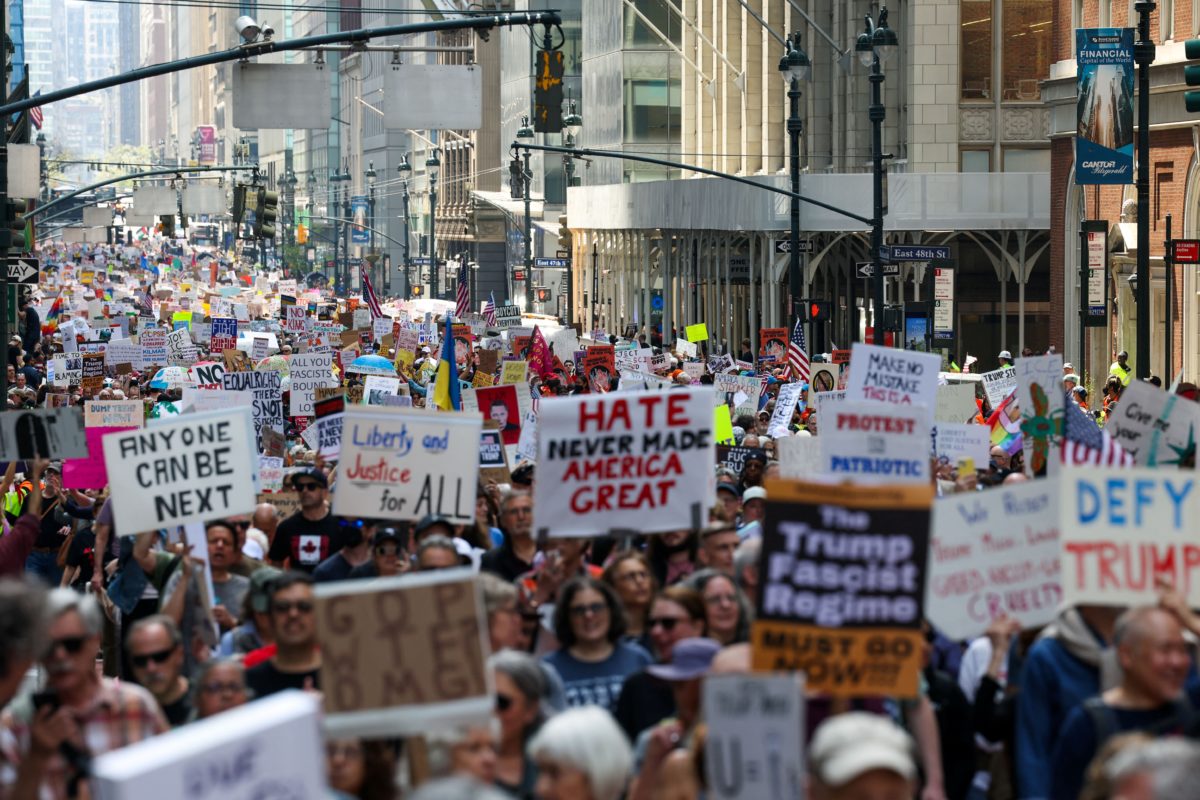 PHOTOS: Anti-Trump protesters rally in cities and towns across the ...